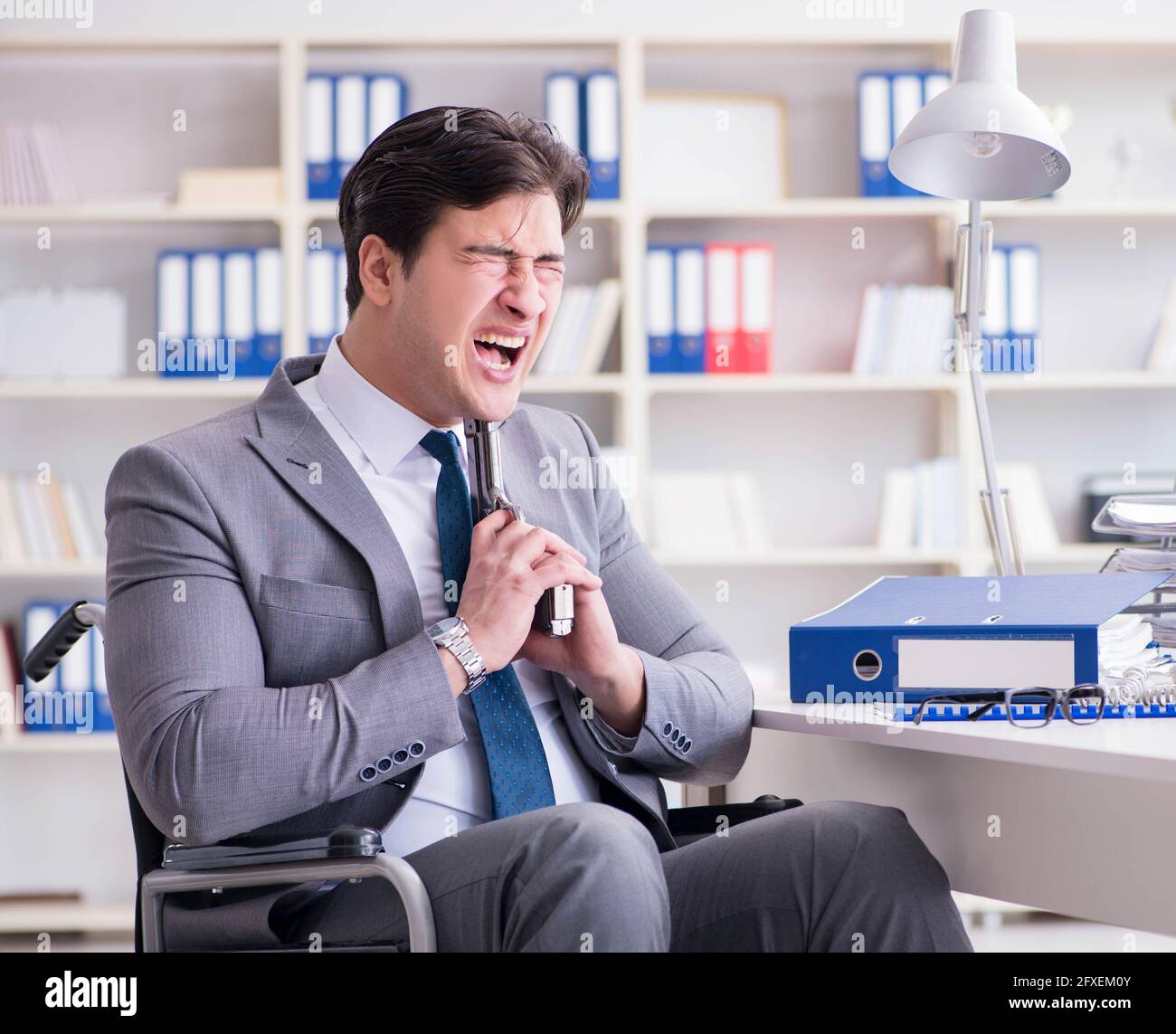 Disabled businessman on wheelchair in disability concept Stock Photo ...