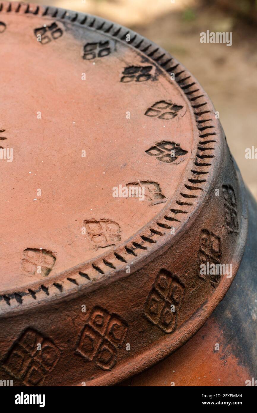 Closeup Thai pattern design of earthenware pottery Stock Photo - Alamy