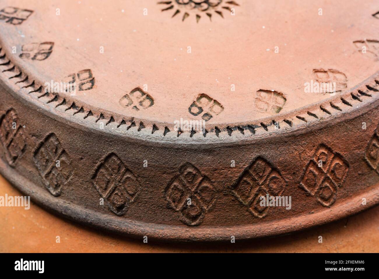 Closeup Thai pattern design of earthenware pottery Stock Photo - Alamy
