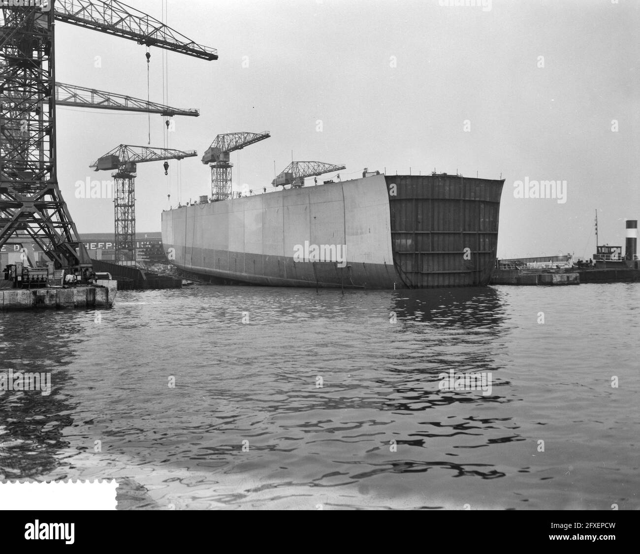 Launching of half ship at the NDSM, February 5, 1960, shipbuilding, The ...