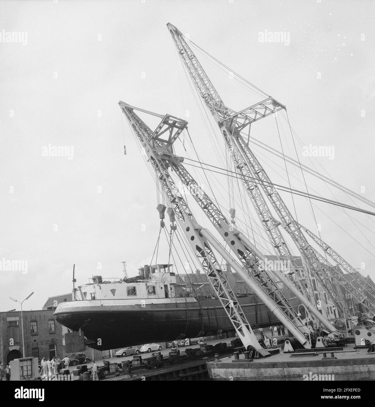 Two floating cranes launch hi-res stock photography and images - Alamy