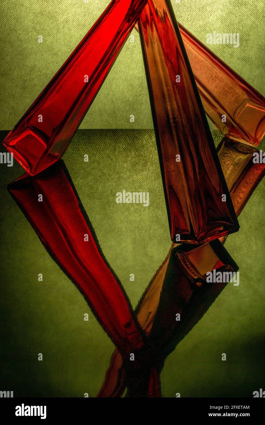 Abstract composition of glass objects on a reflective surface Stock ...