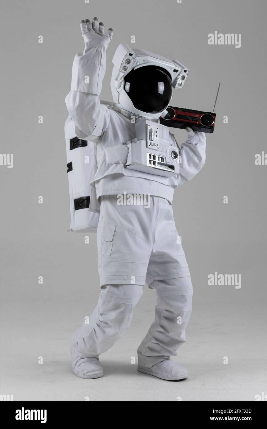happy astronaut listening to radio music, white background Stock Photo ...