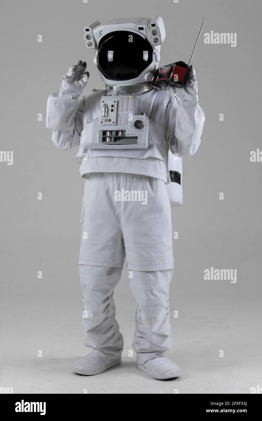 happy astronaut listening to radio music, white background Stock Photo ...