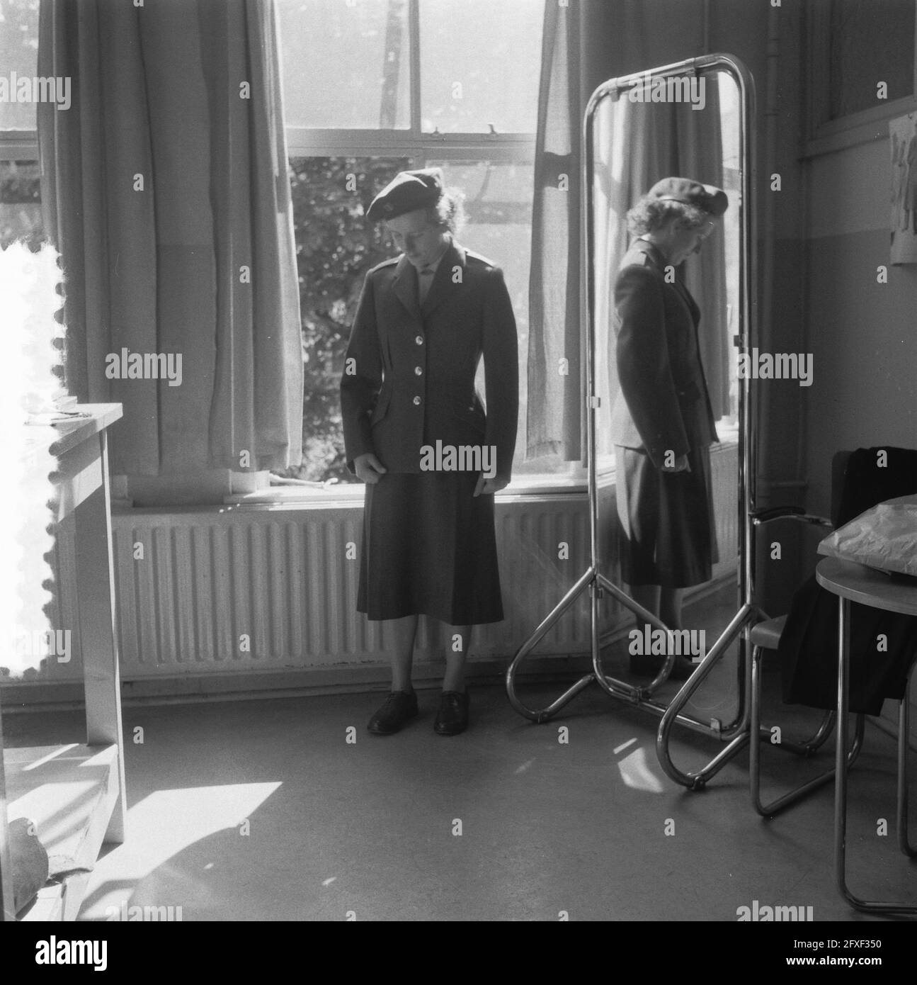 Tram conductors receive their uniforms, 14 May 1954, uniforms, The ...