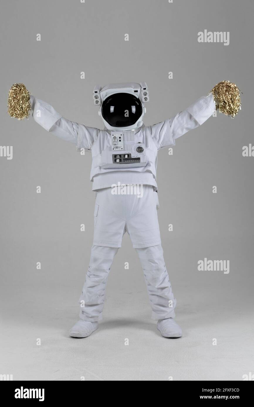 astronaut with cheer pompom, white background Stock Photo - Alamy