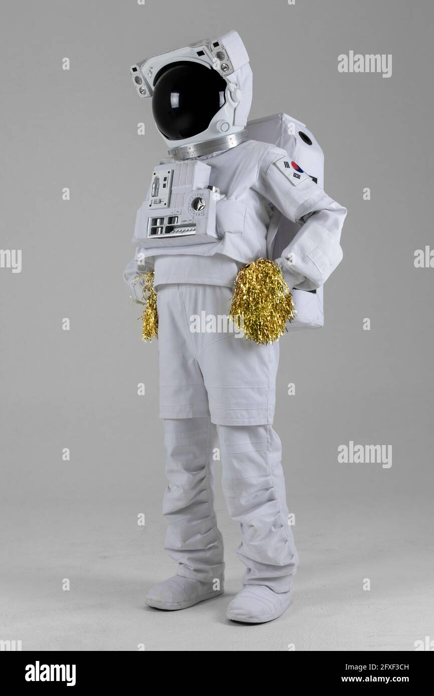 astronaut with cheer pompom, white background Stock Photo - Alamy