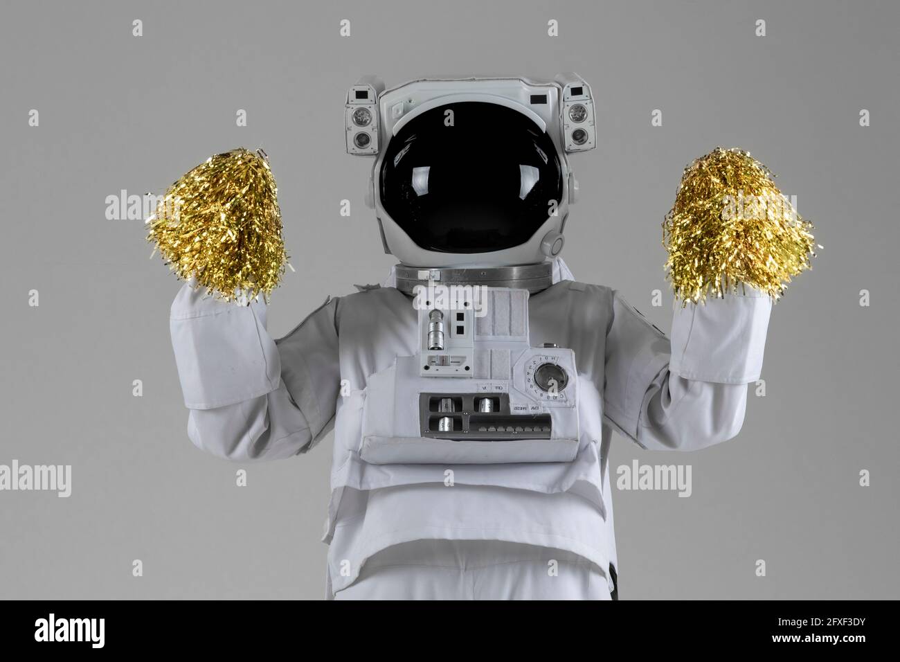 astronaut with cheer pompom, white background Stock Photo - Alamy