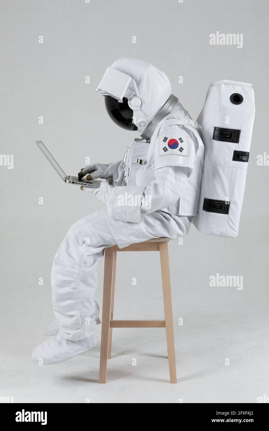 Astronaut making video call, white background Stock Photo - Alamy