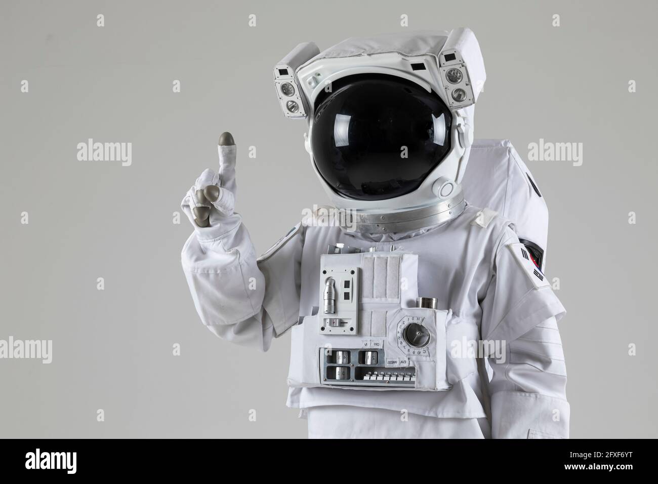 astronaut counting numbers, white background Stock Photo - Alamy