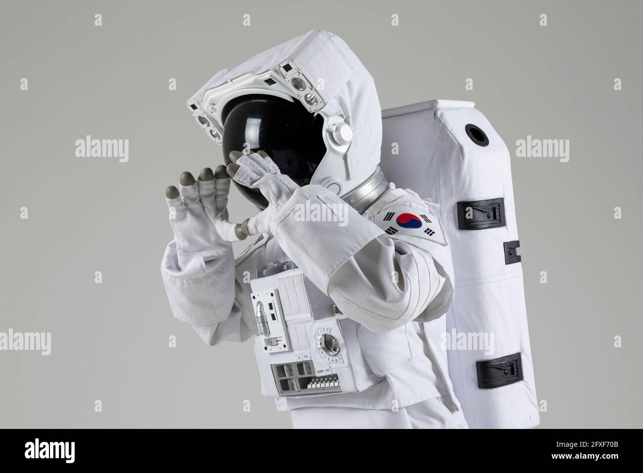 Astronaut shouting, announcing in, white background Stock Photo - Alamy