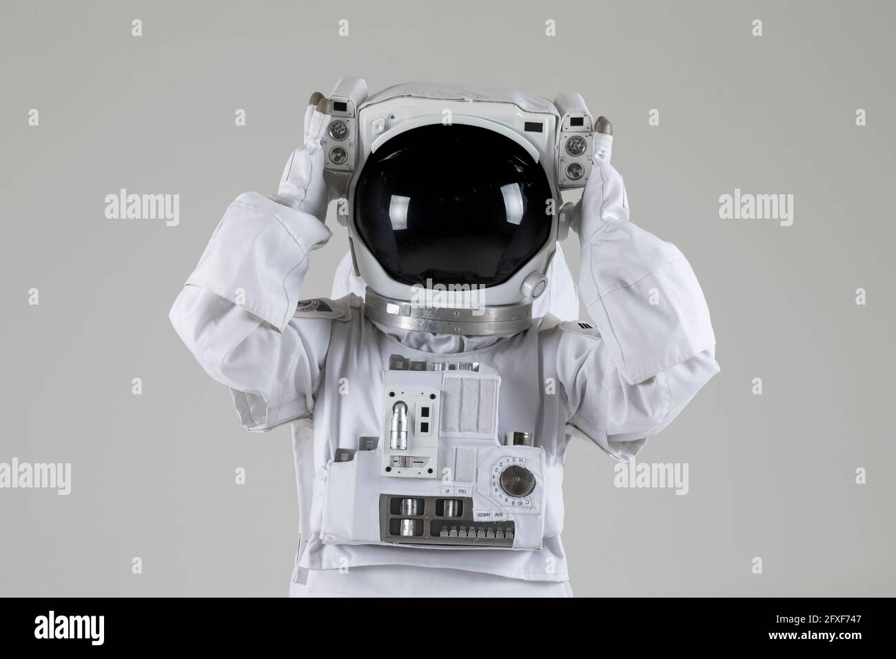 depressed astronaut, white background Stock Photo - Alamy