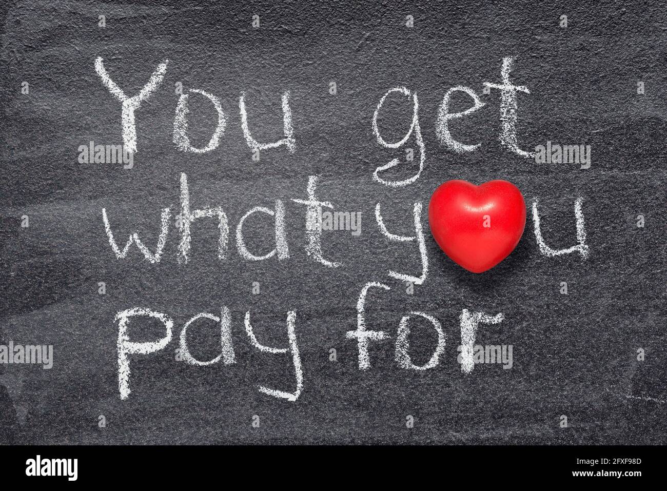 You get what you pay for saying written on chalkboard with red heart ...