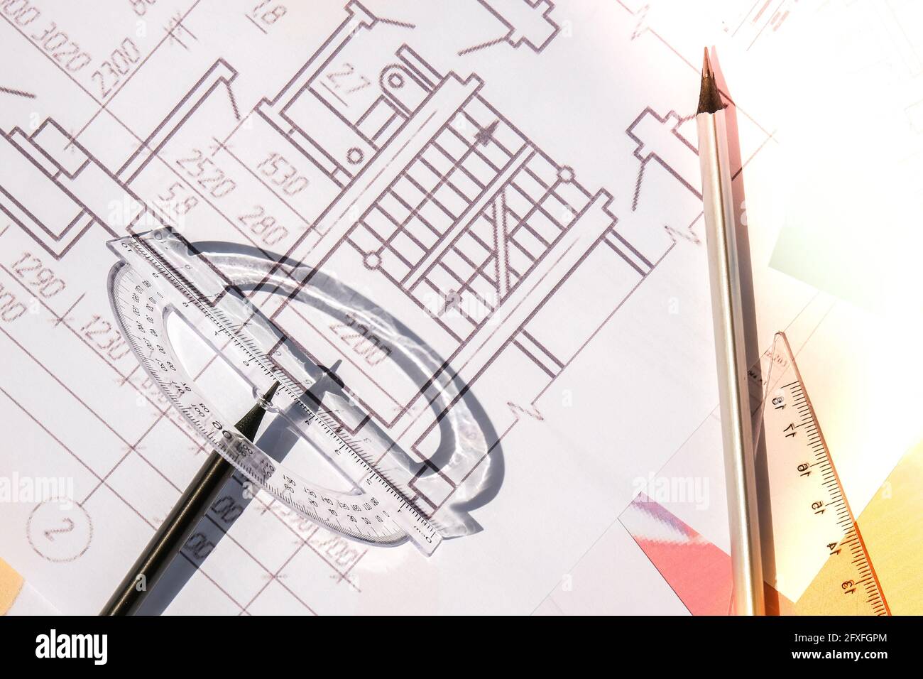 A pencil with a protractor. Architectural Project drawings with tools ...