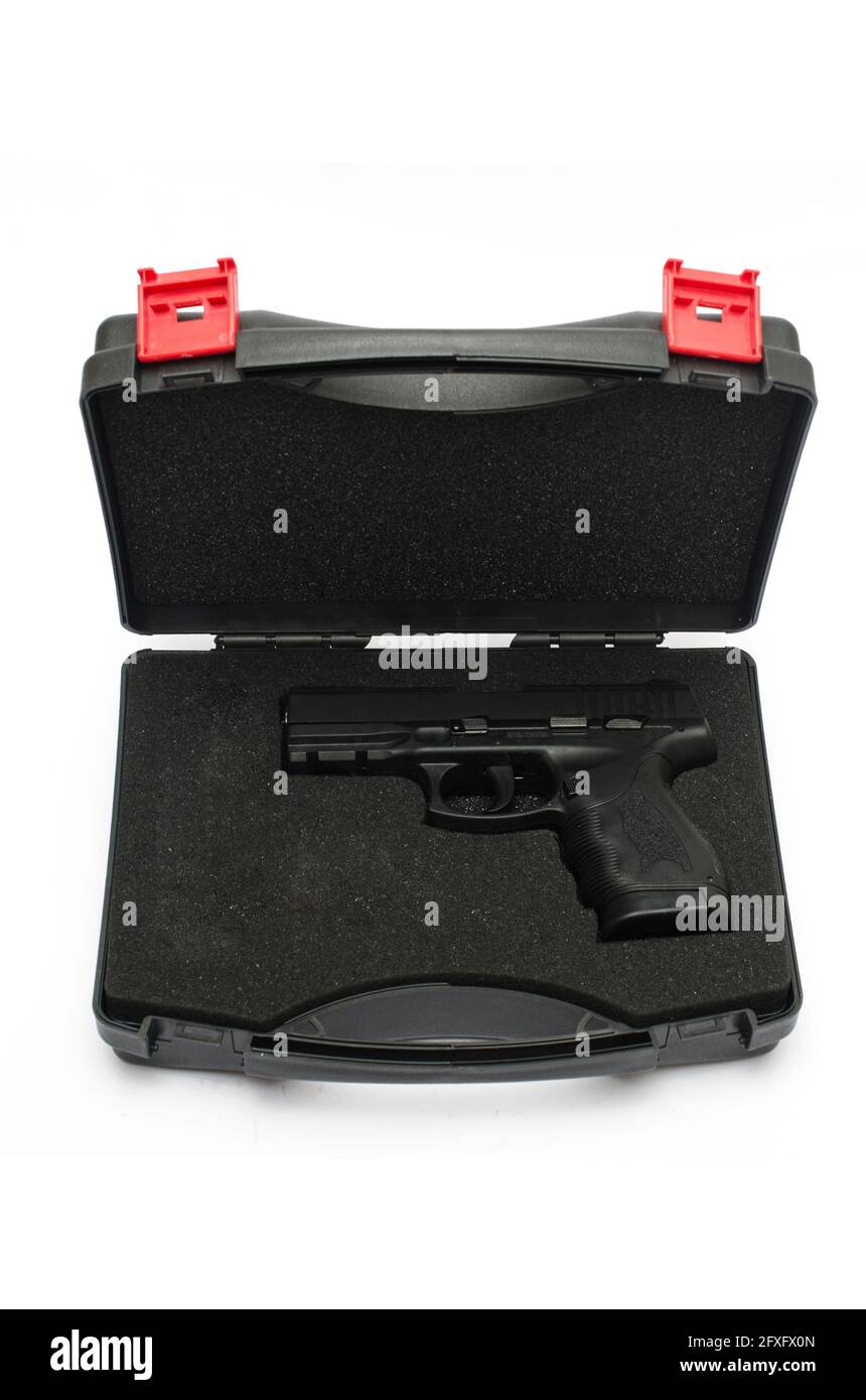 automatic pistol in a black plastic box Stock Photo - Alamy