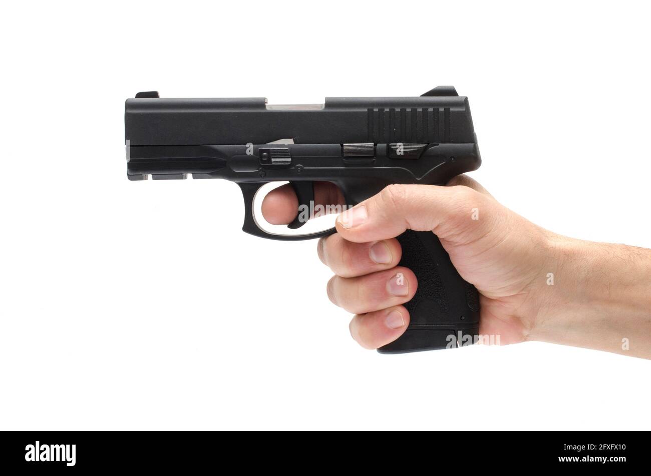 Gun, pistol in hand isolated on white Stock Photo - Alamy