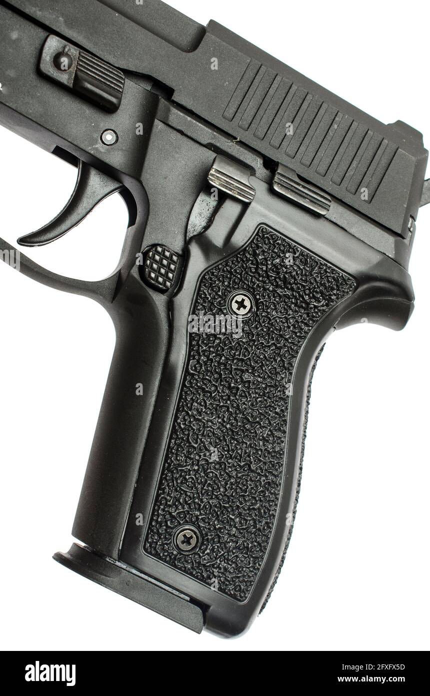 handle of pistol isolated Stock Photo - Alamy