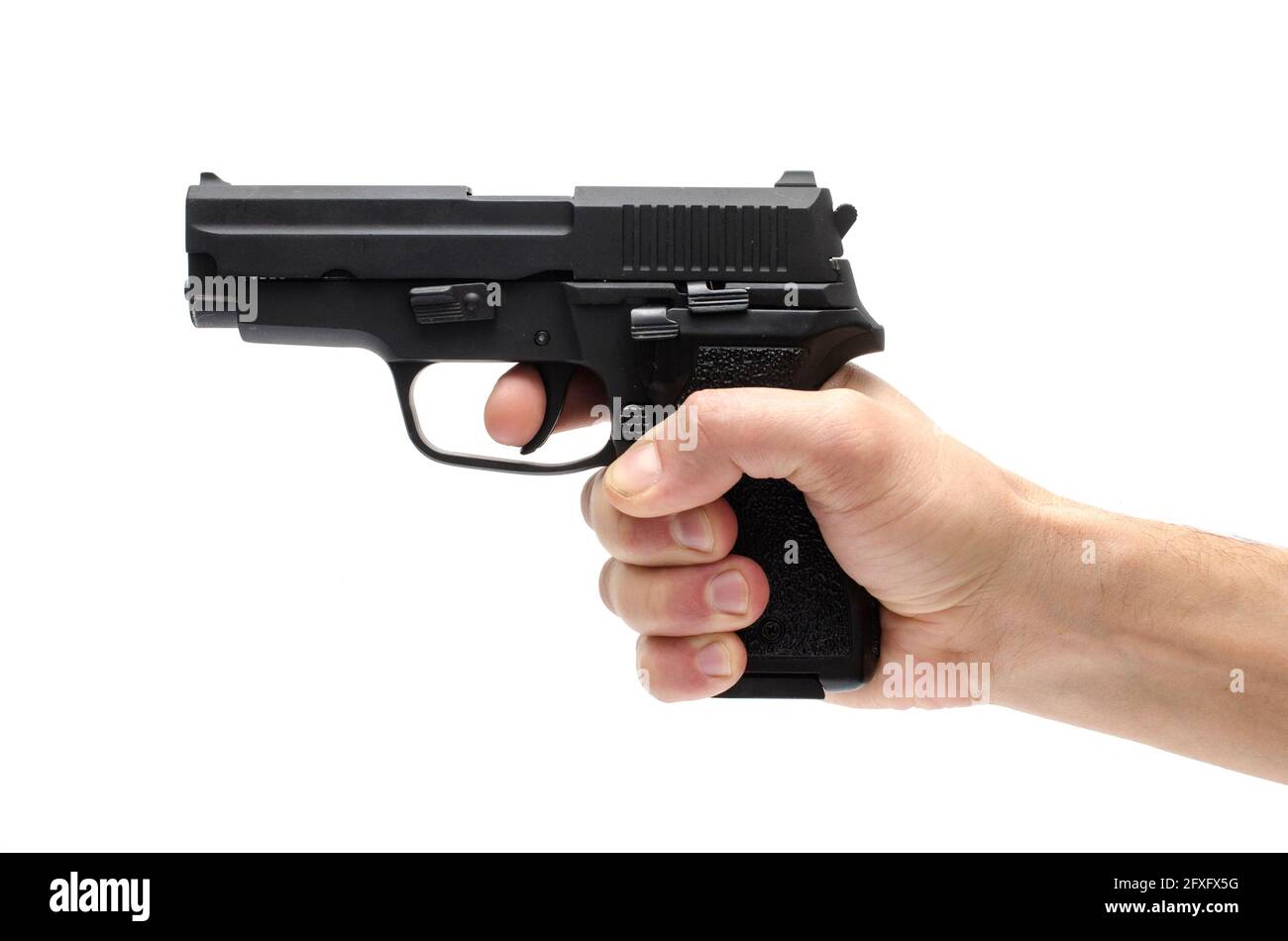 Gun, pistol in hand isolated on white Stock Photo - Alamy