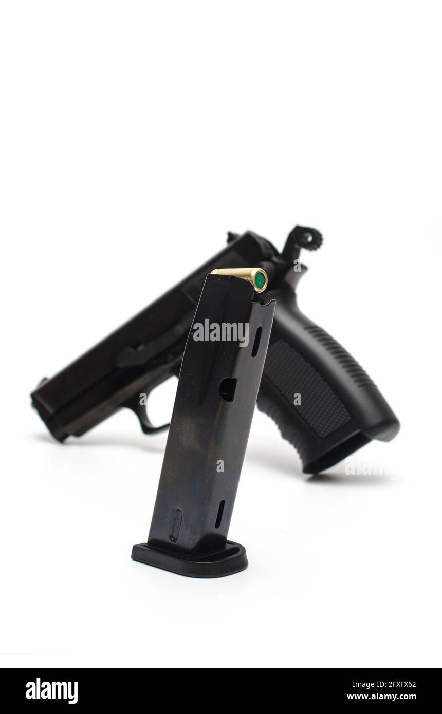 pistol shop on the background of a pistol Stock Photo - Alamy