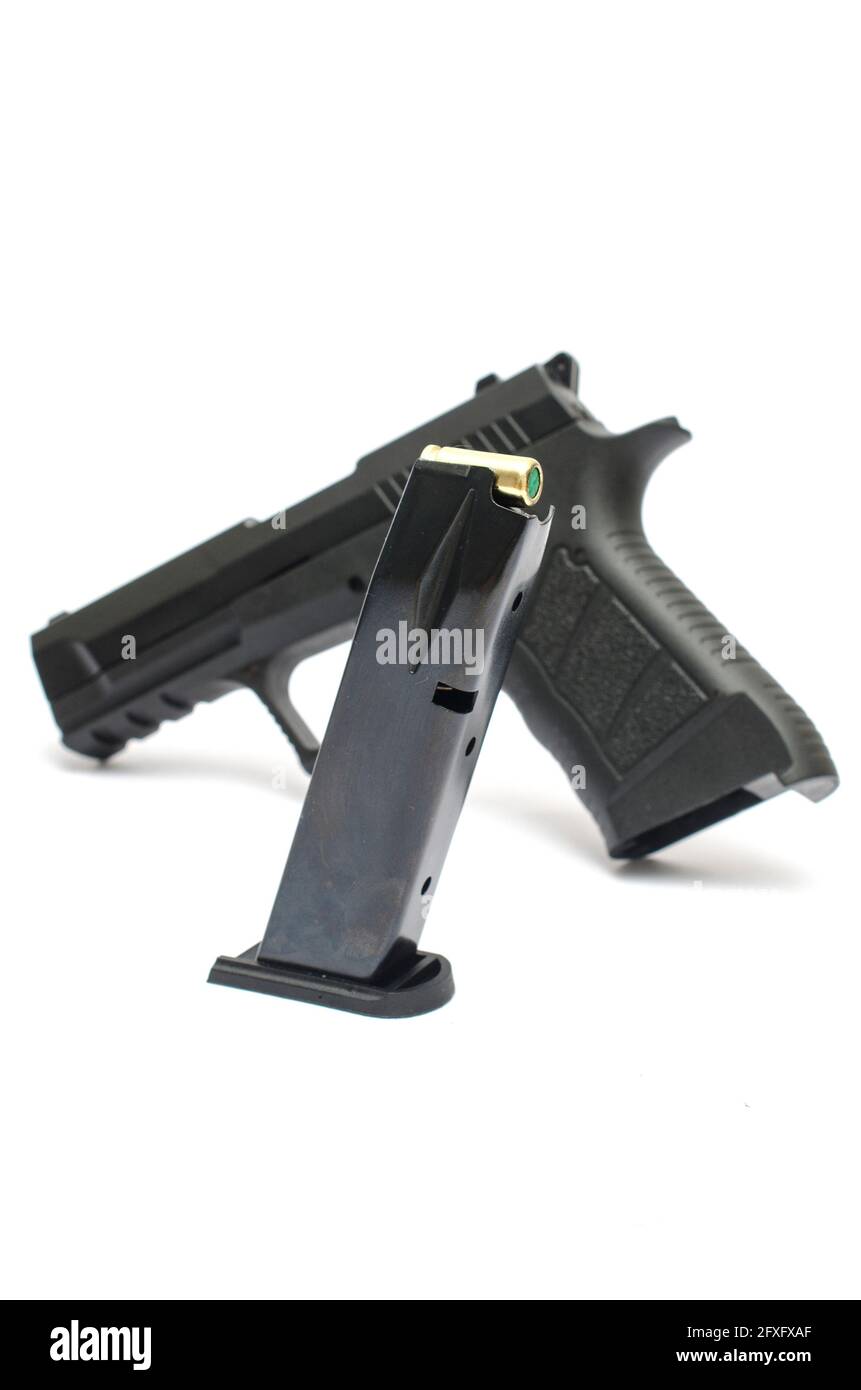 pistol shop on the background of a pistol Stock Photo - Alamy