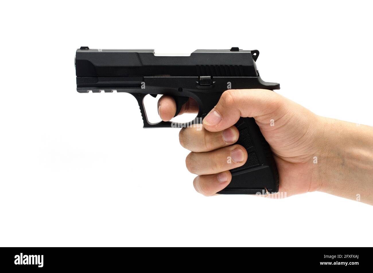 Gun, pistol in hand isolated on white Stock Photo - Alamy