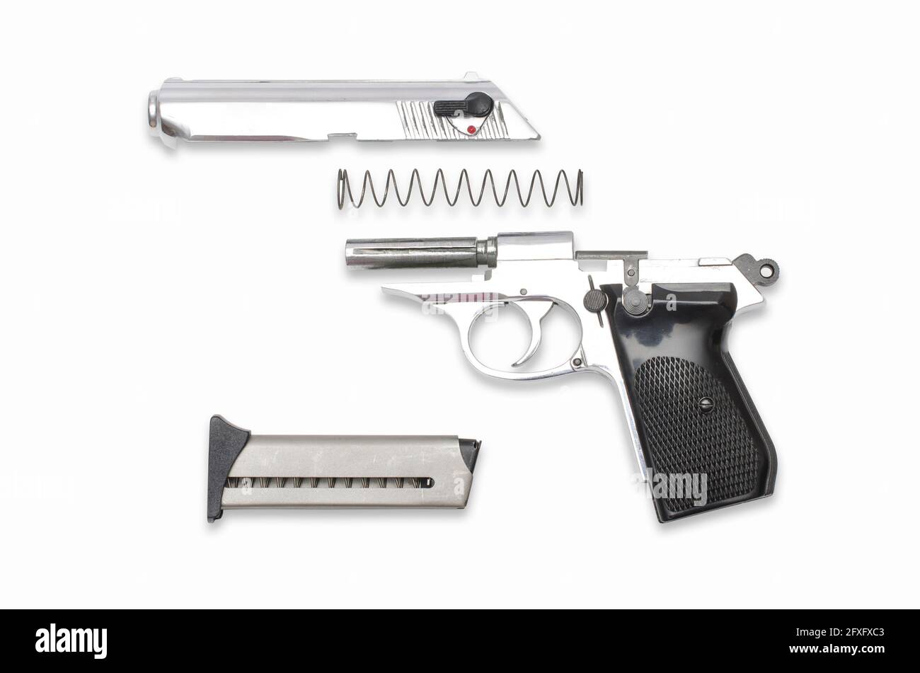 disassembled gun on a white background Stock Photo - Alamy