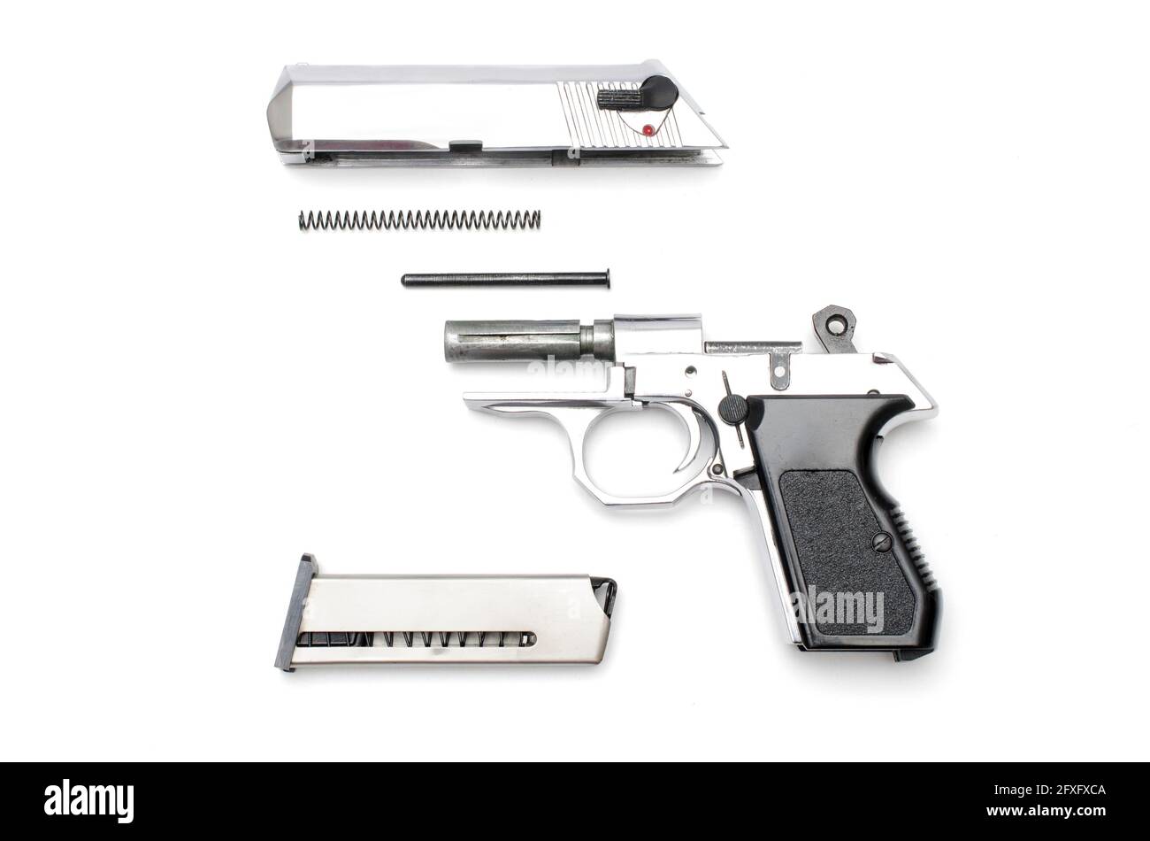 disassembled gun on a white background Stock Photo - Alamy