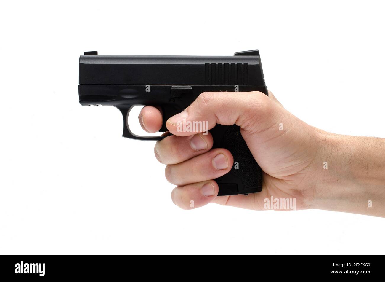 Gun, pistol in hand isolated on white Stock Photo - Alamy