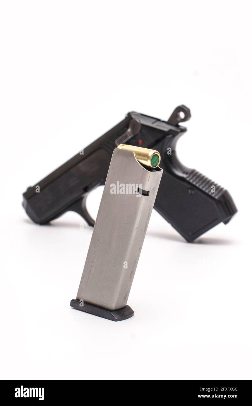 pistol shop on the background of a pistol Stock Photo - Alamy