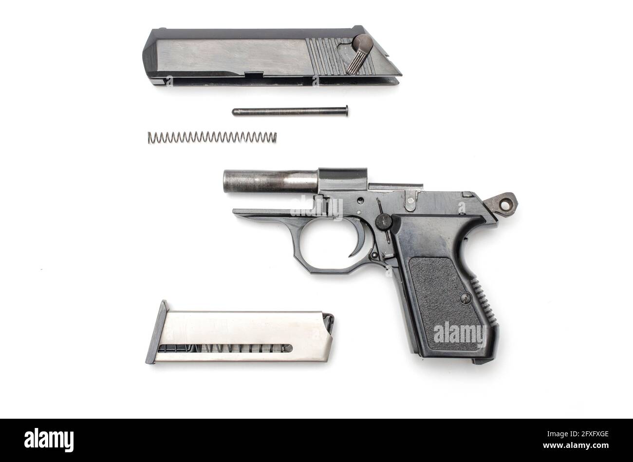 disassembled gun on a white background Stock Photo - Alamy