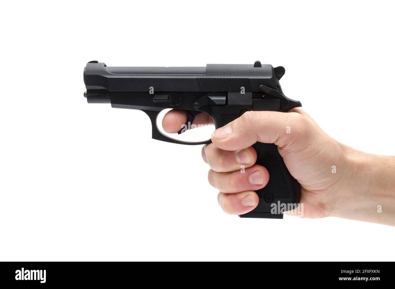 Gun, pistol in hand isolated on white Stock Photo - Alamy
