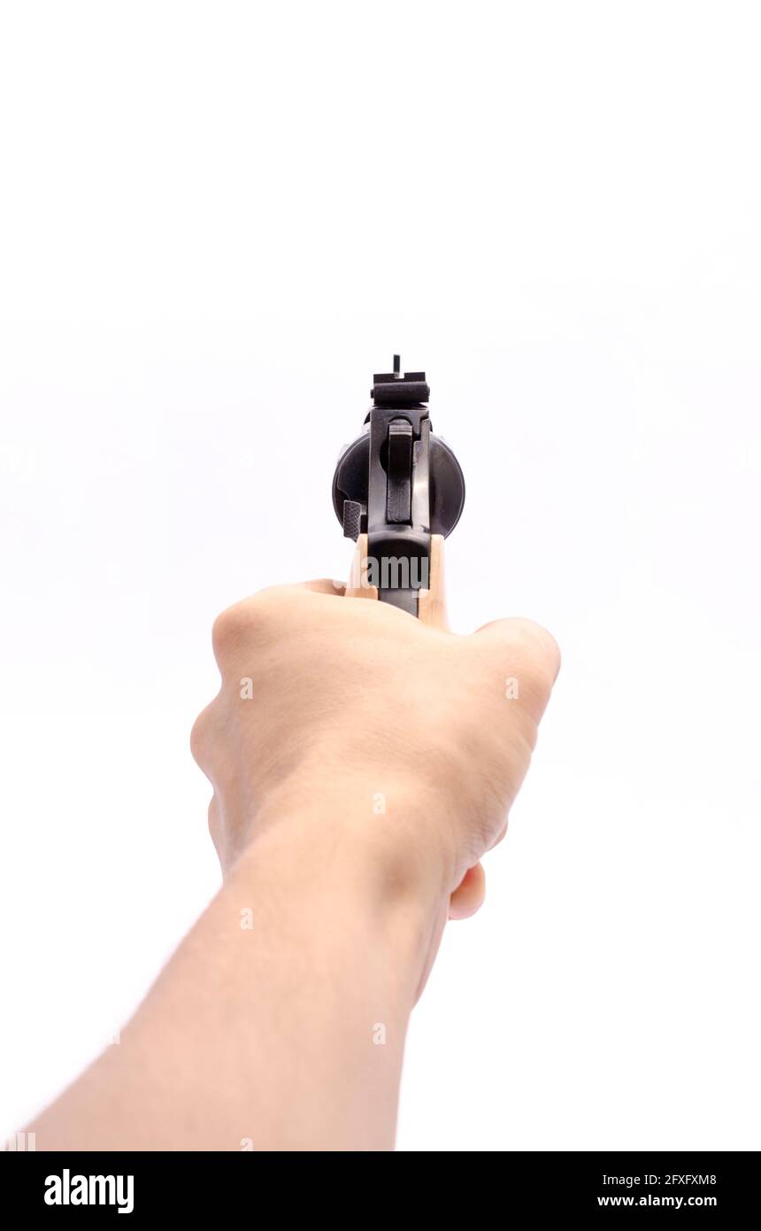 hand holding a revolver from the rear view isolated on white Stock ...