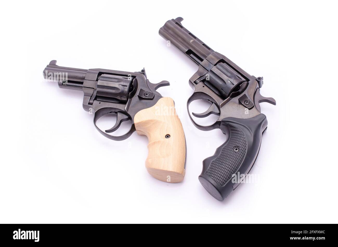 two revolvers with gun drums isolated on white Stock Photo - Alamy