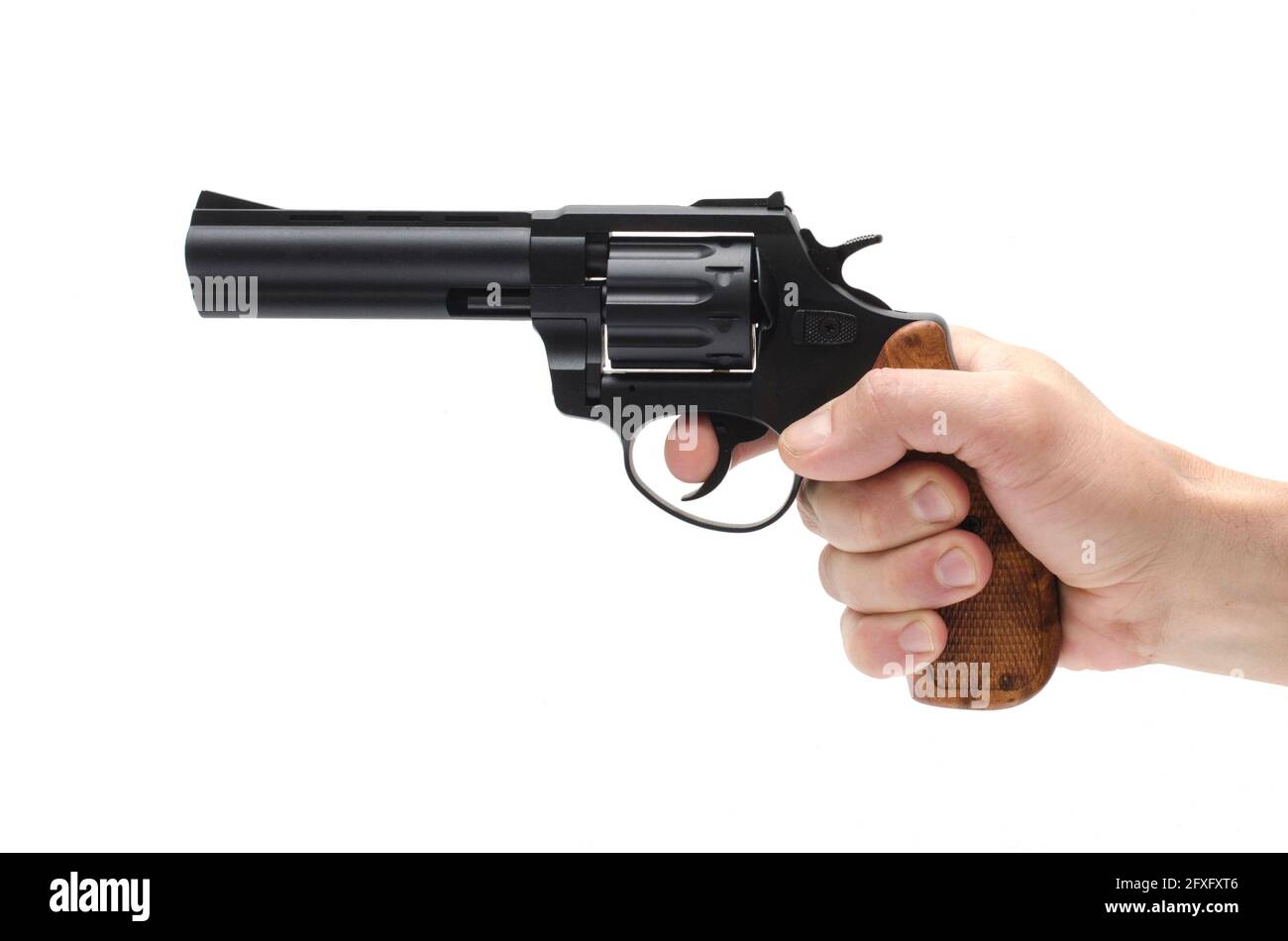 revolver in hand on a white background Stock Photo - Alamy