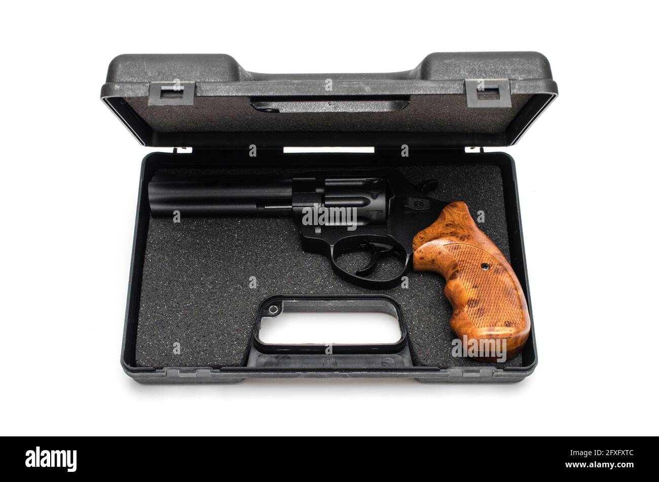revolver on black plastic box Stock Photo - Alamy