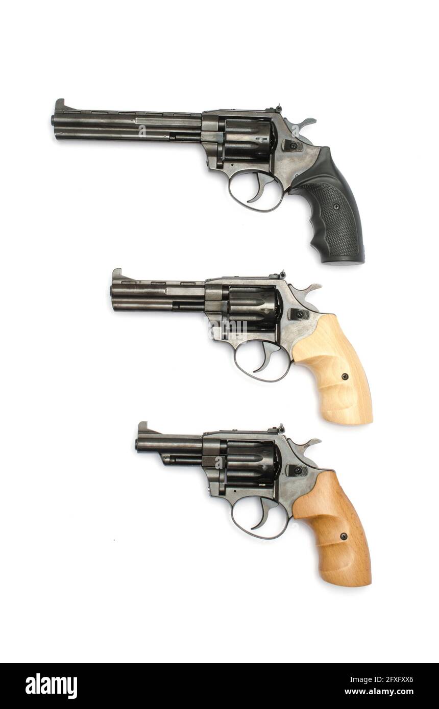 three revolvers with gun drums isolated on white Stock Photo - Alamy