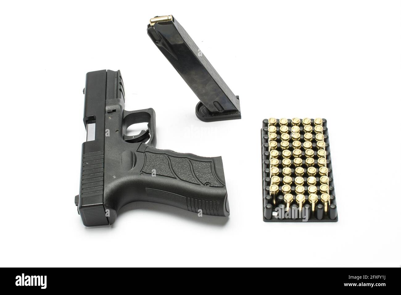 pistol, magazine,bullets set isolated on white Stock Photo - Alamy