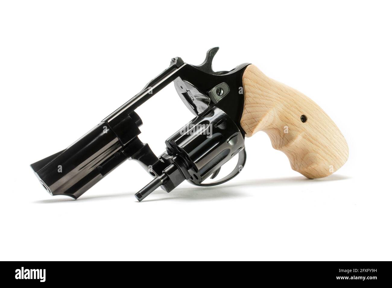 Short-barreled revolver with wooden handle isolated Stock Photo - Alamy