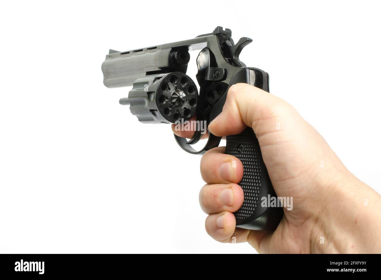 Revolver, gun, pistol in hand isolated on white Stock Photo - Alamy