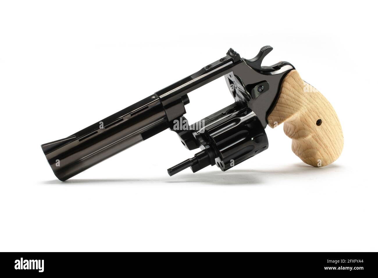 long-barreled revolver with a wooden handle isolated Stock Photo - Alamy