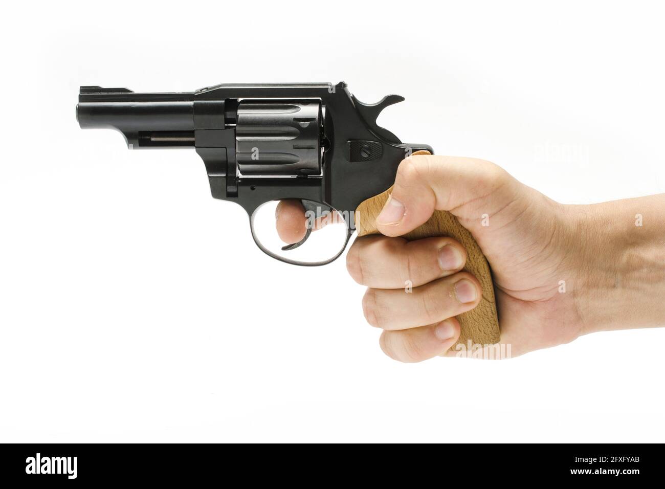 Revolver, gun, pistol in hand isolated on white Stock Photo - Alamy