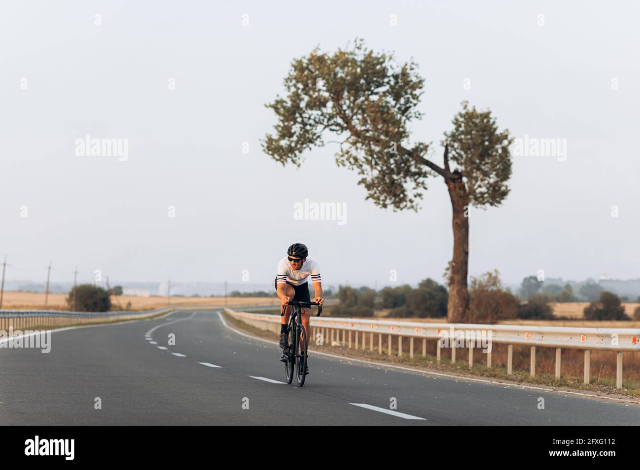 Man road biking hi-res stock photography and images - Alamy