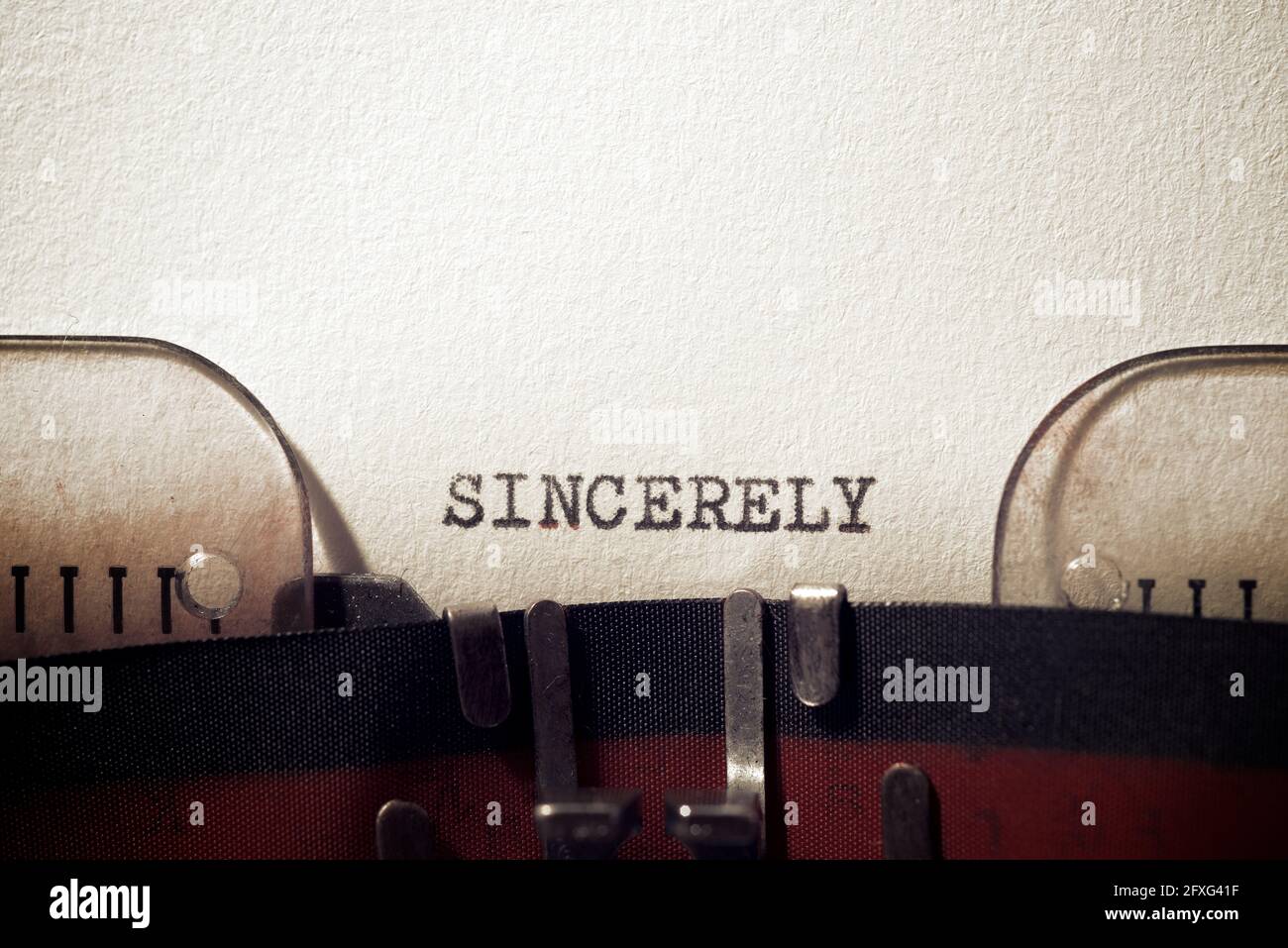 Sincerely word written with a typewriter Stock Photo - Alamy