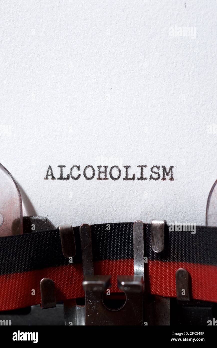 Alcoholism word written with a typewriter Stock Photo - Alamy
