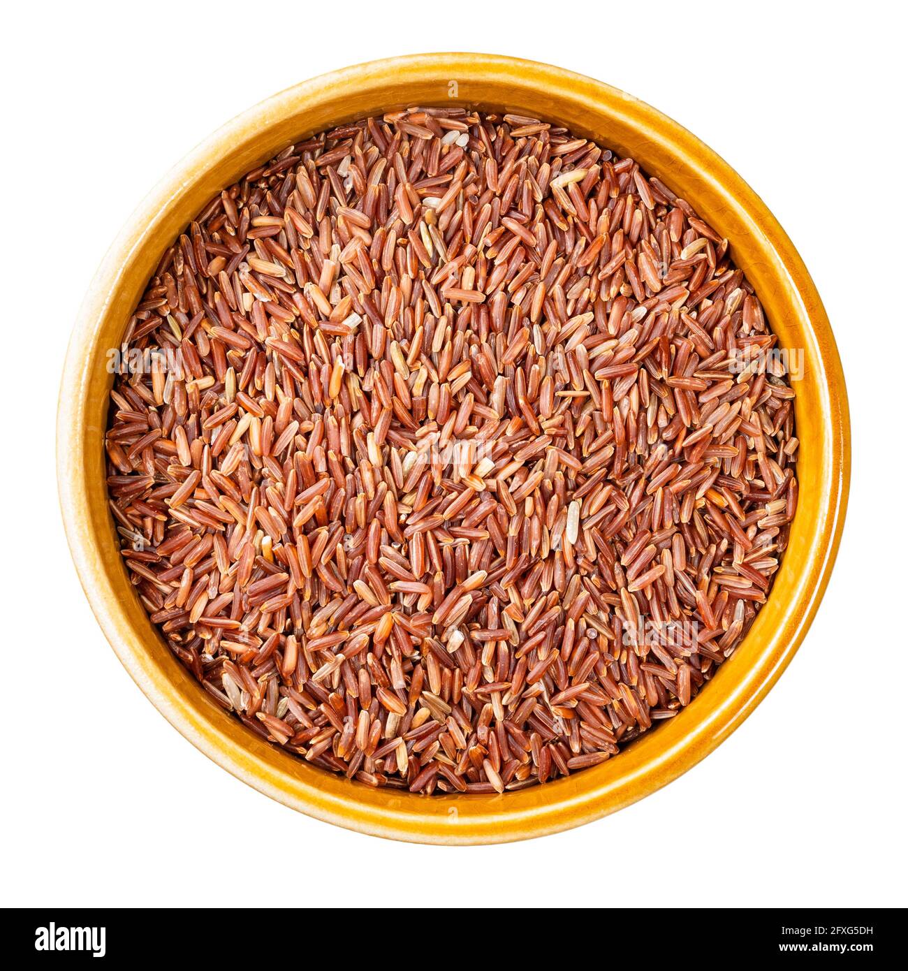 top view of raw red rice in round bowl cutout on white background Stock ...