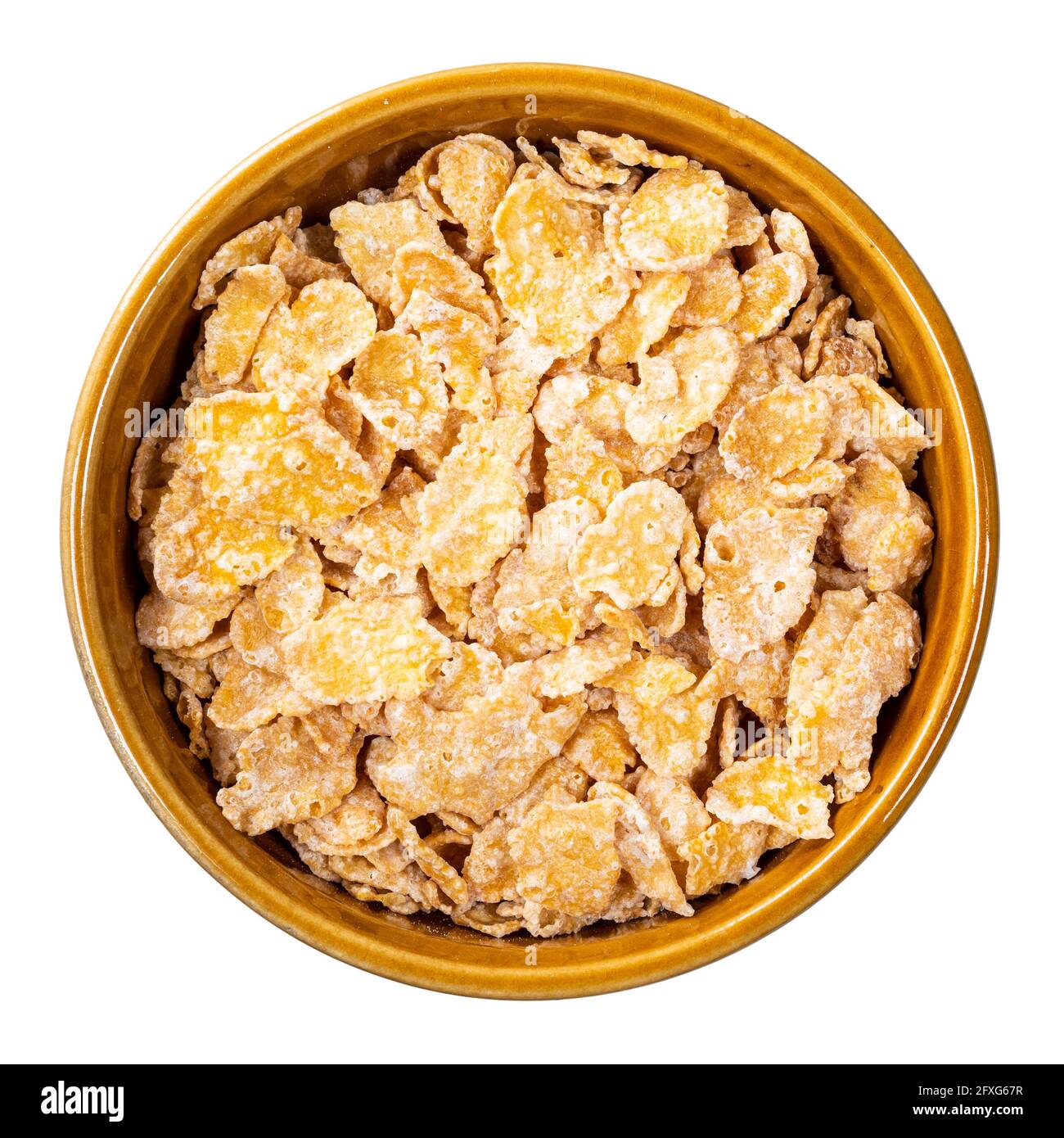 top view of sugar-coated cornflakes in round bowl cutout on white ...