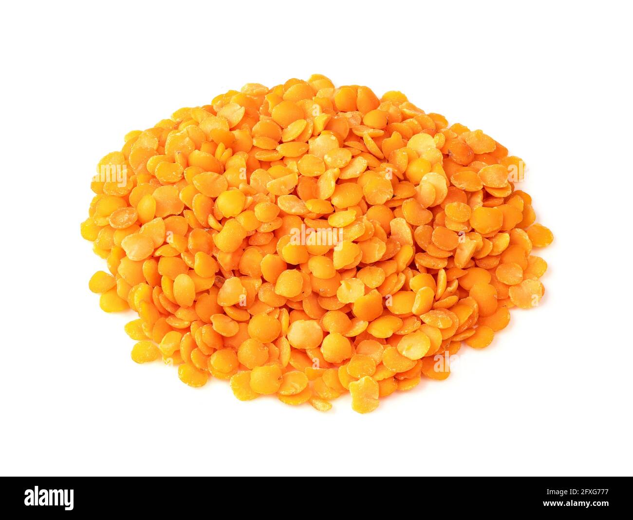 handful of split red lentils closeup on white background Stock Photo ...