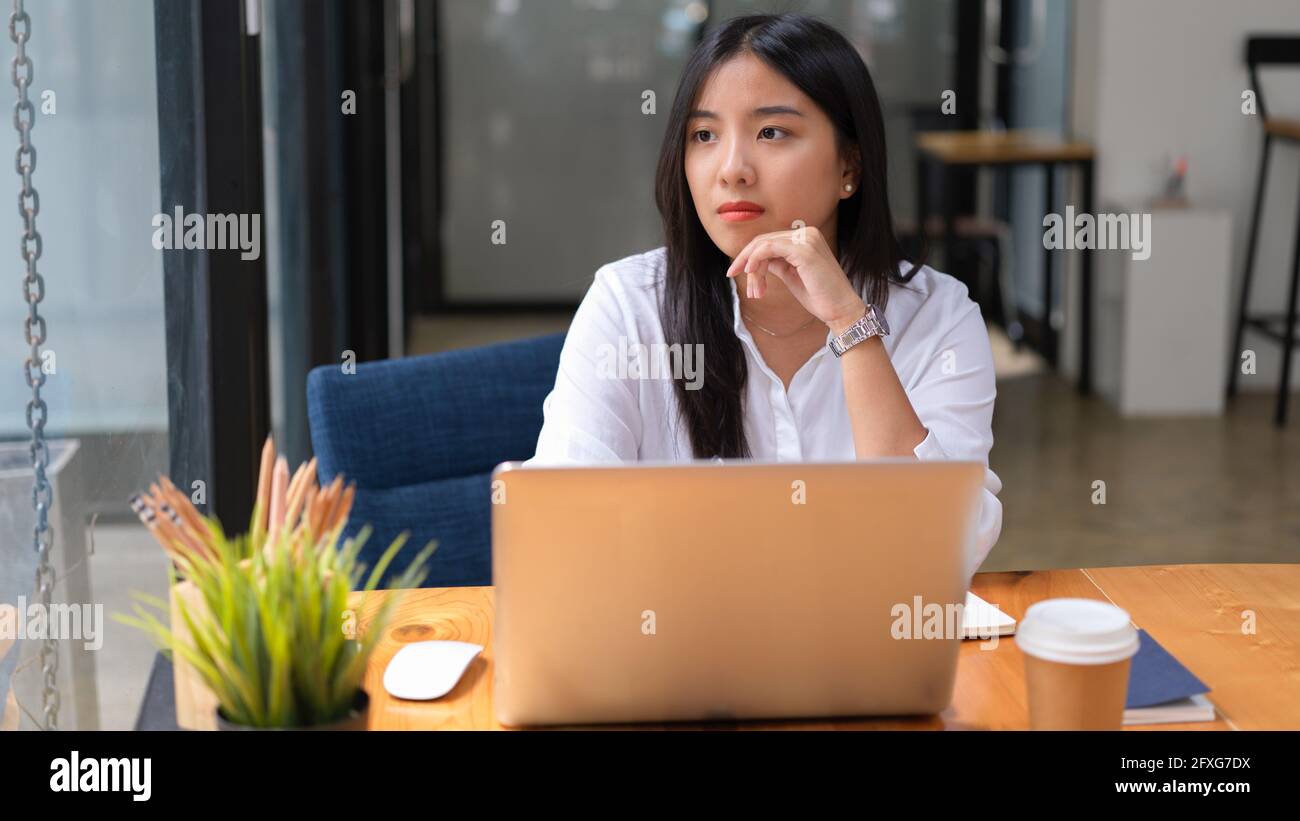 Looking out of office window hi-res stock photography and images - Alamy