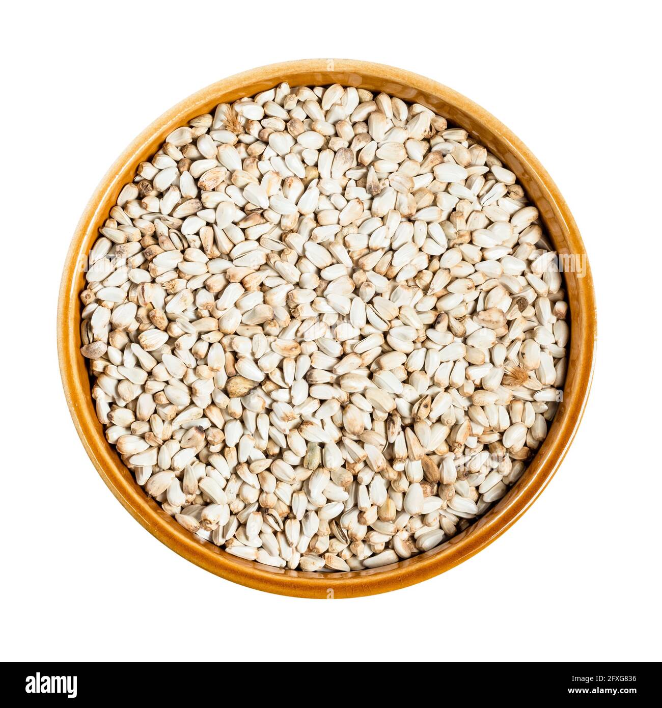 top view of Safflower seeds in round ceramic bowl cutout on white ...