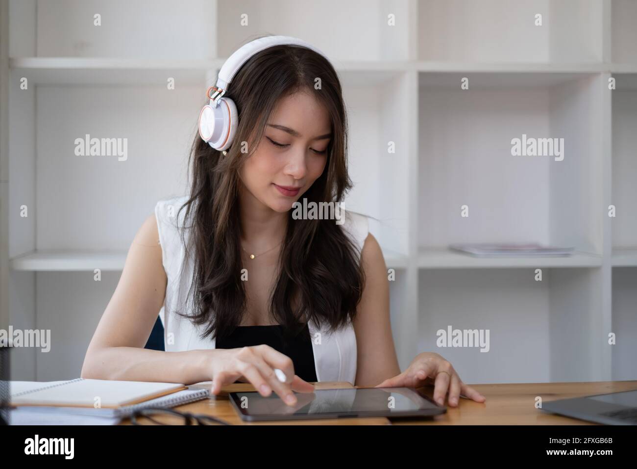 Closeup of female ux developer and ui designer about mobile phone app ...